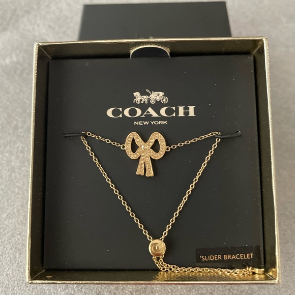 Coach | Jewelry | Coach Gold Tone Studded Bow Slider Bracelet | Poshmark